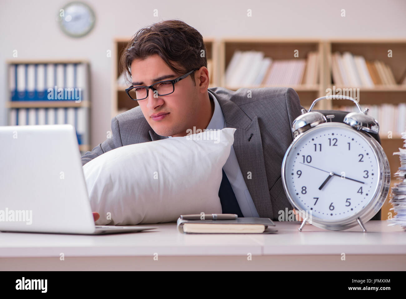 Yawning tired man home office hi-res stock photography and images - Alamy