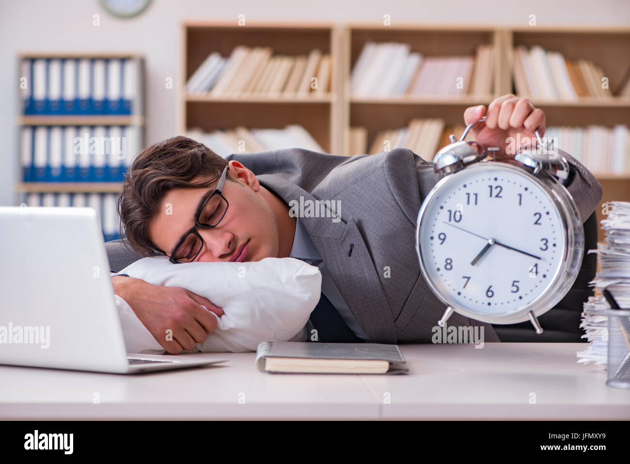Tired man sleeping at home having too much work Stock Photo - Alamy