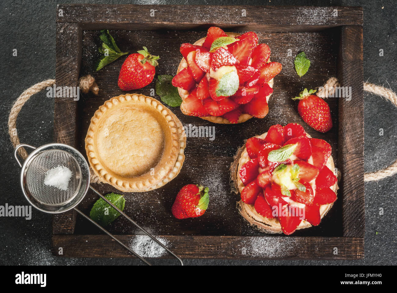 Summer and spring dessert. Home pies tartlets with custard and ...