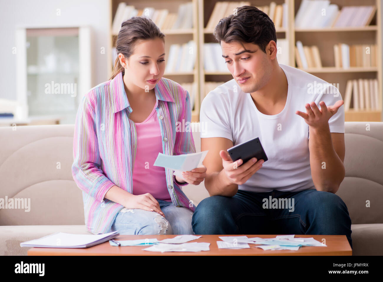 The young family discussing family finances Stock Photo - Alamy