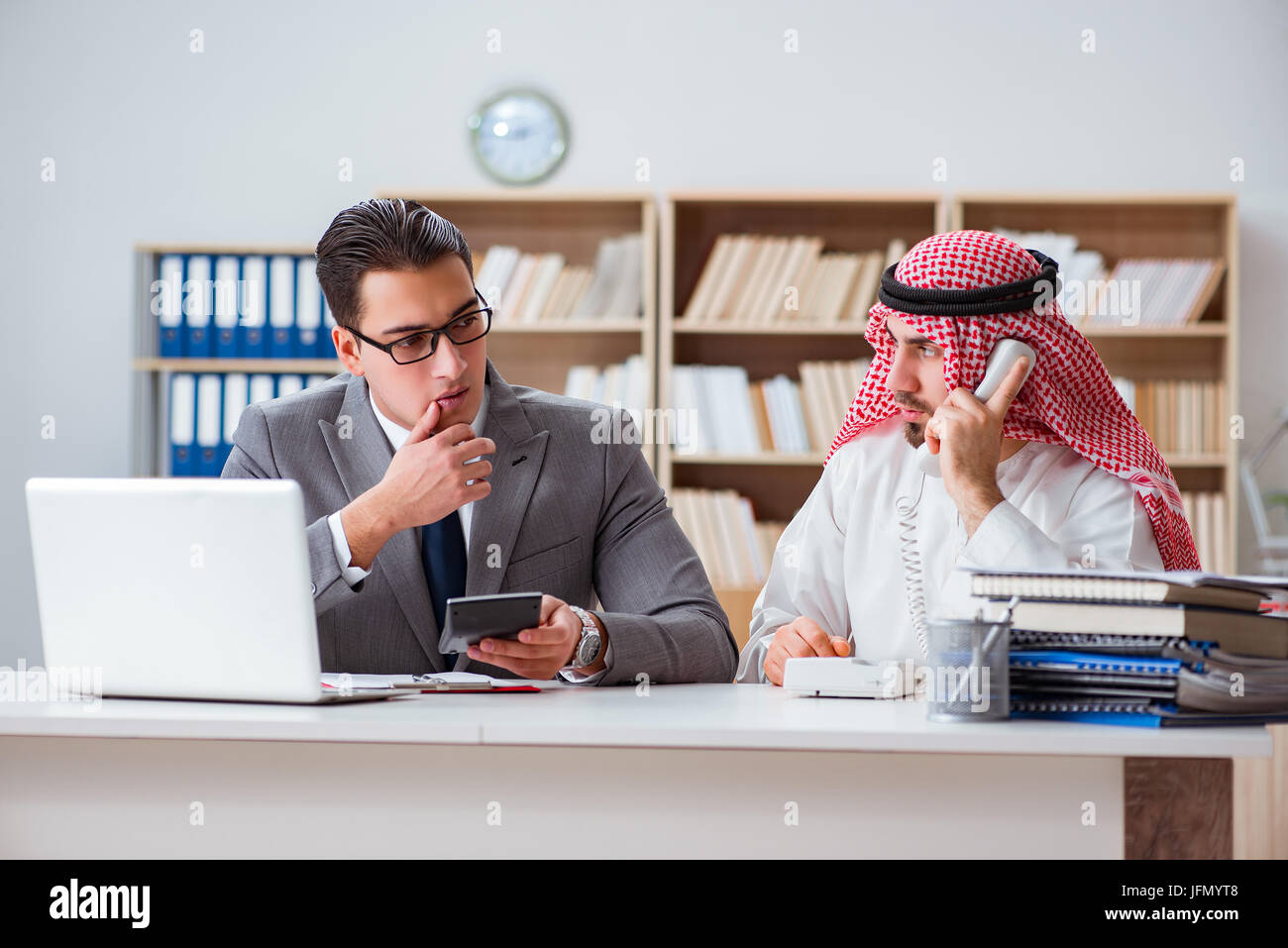 The diverse business concept with arab businessman Stock Photo - Alamy