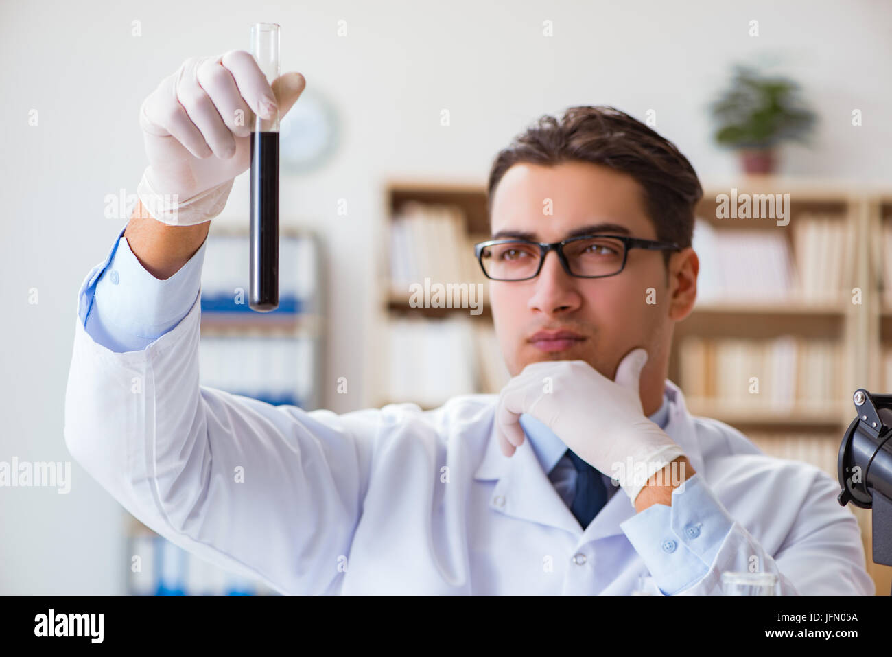 The chemical engineer working on oil samples in lab Stock Photo - Alamy