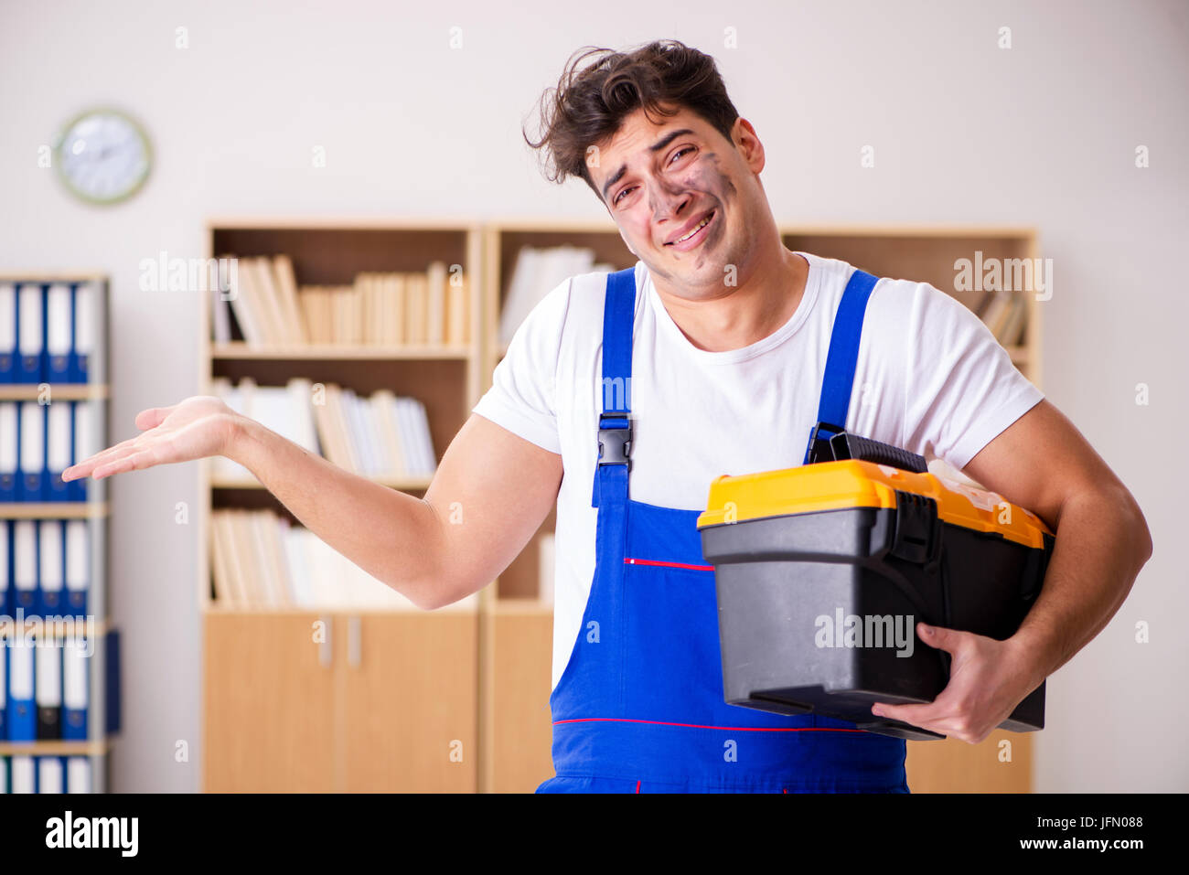 The funny man doing electrical repairs at home Stock Photo - Alamy