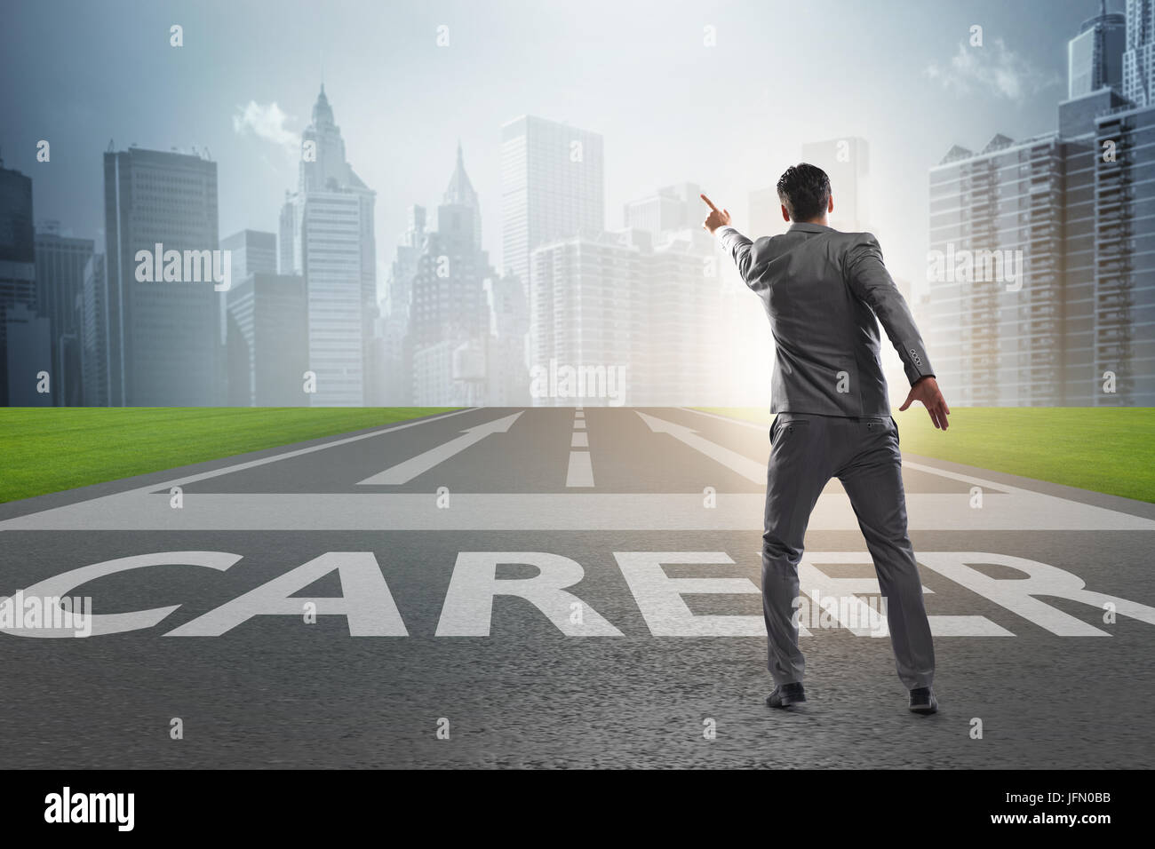 The businessman walking towards his career aspirations Stock Photo - Alamy