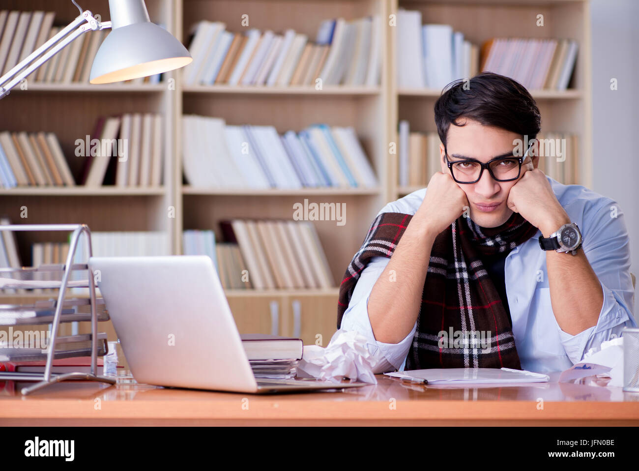 The young writer working in the library Stock Photo - Alamy
