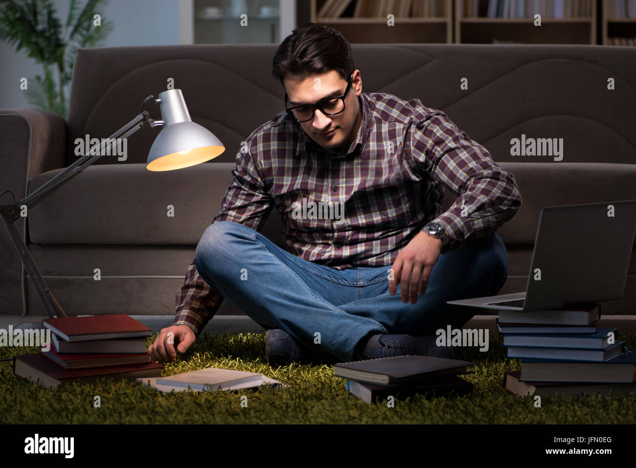 The student reading books preparing for exams Stock Photo - Alamy