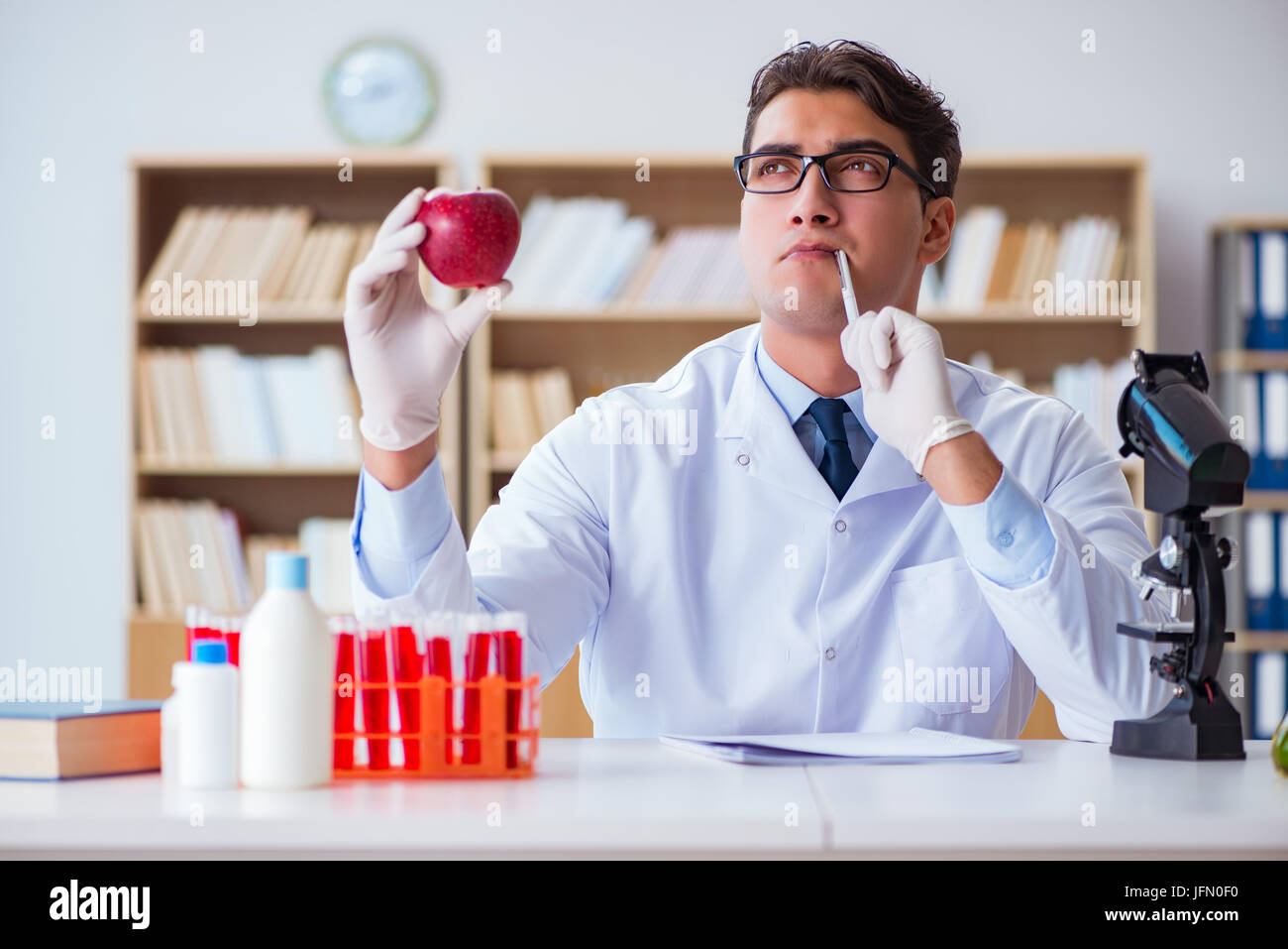 The scientist working on organic fruits and vegetables Stock Photo - Alamy