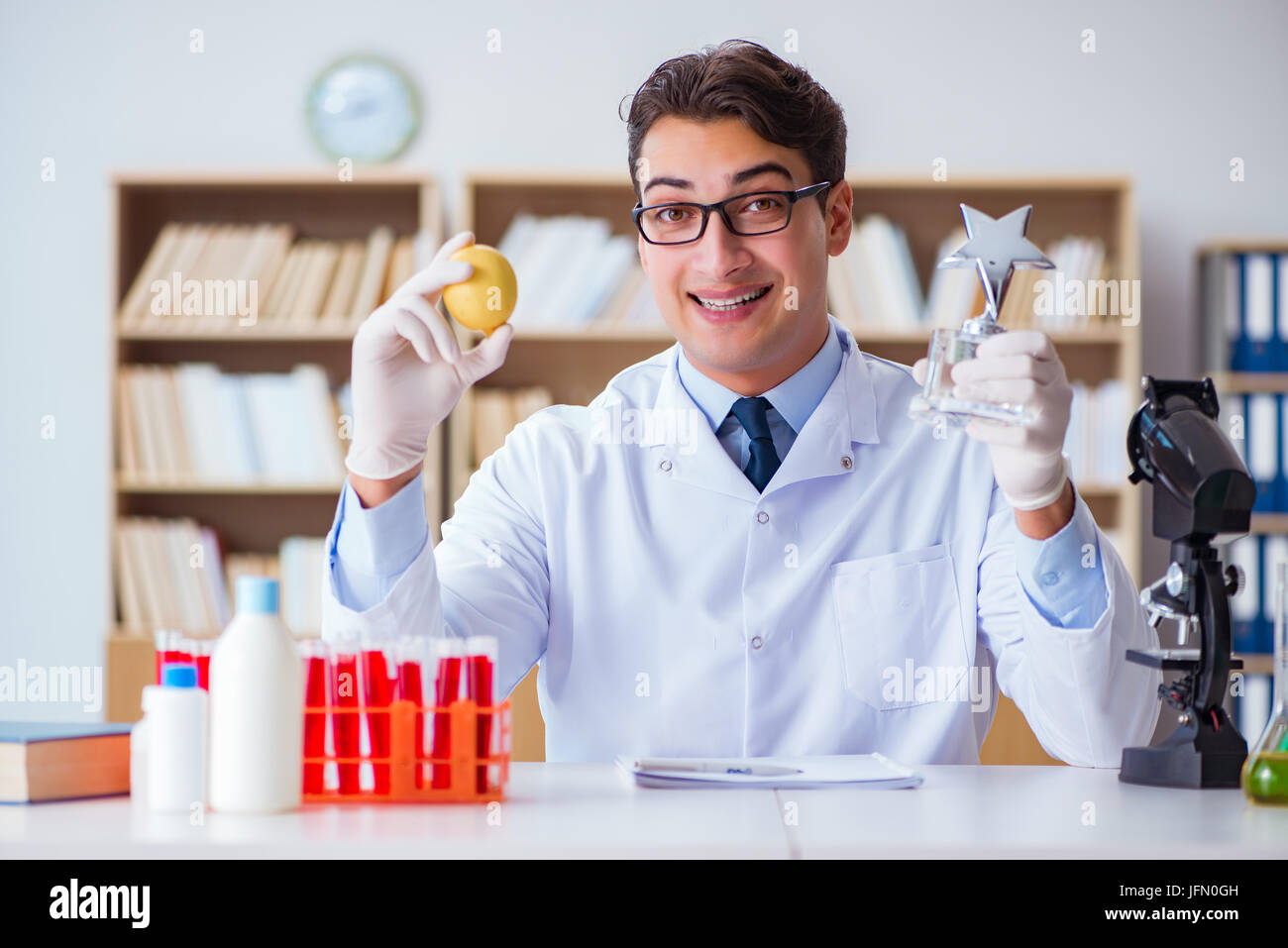 The doctor scientist receiving prize for his research discovery Stock ...