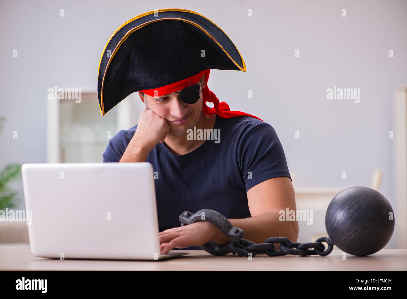 The digital security concept with pirate at computer Stock Photo - Alamy