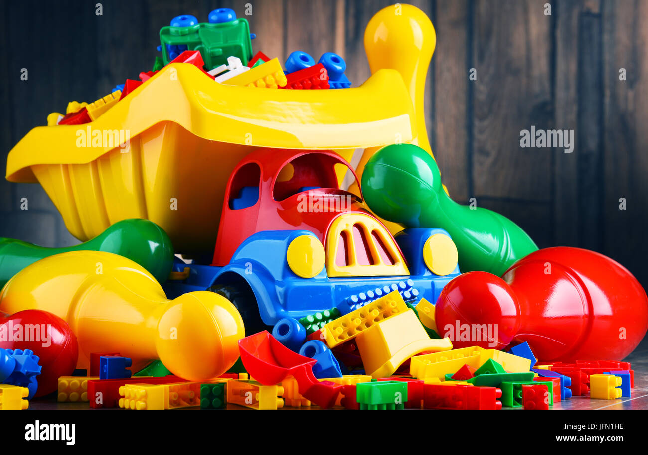 Colorful plastic toys in children's room Stock Photo - Alamy