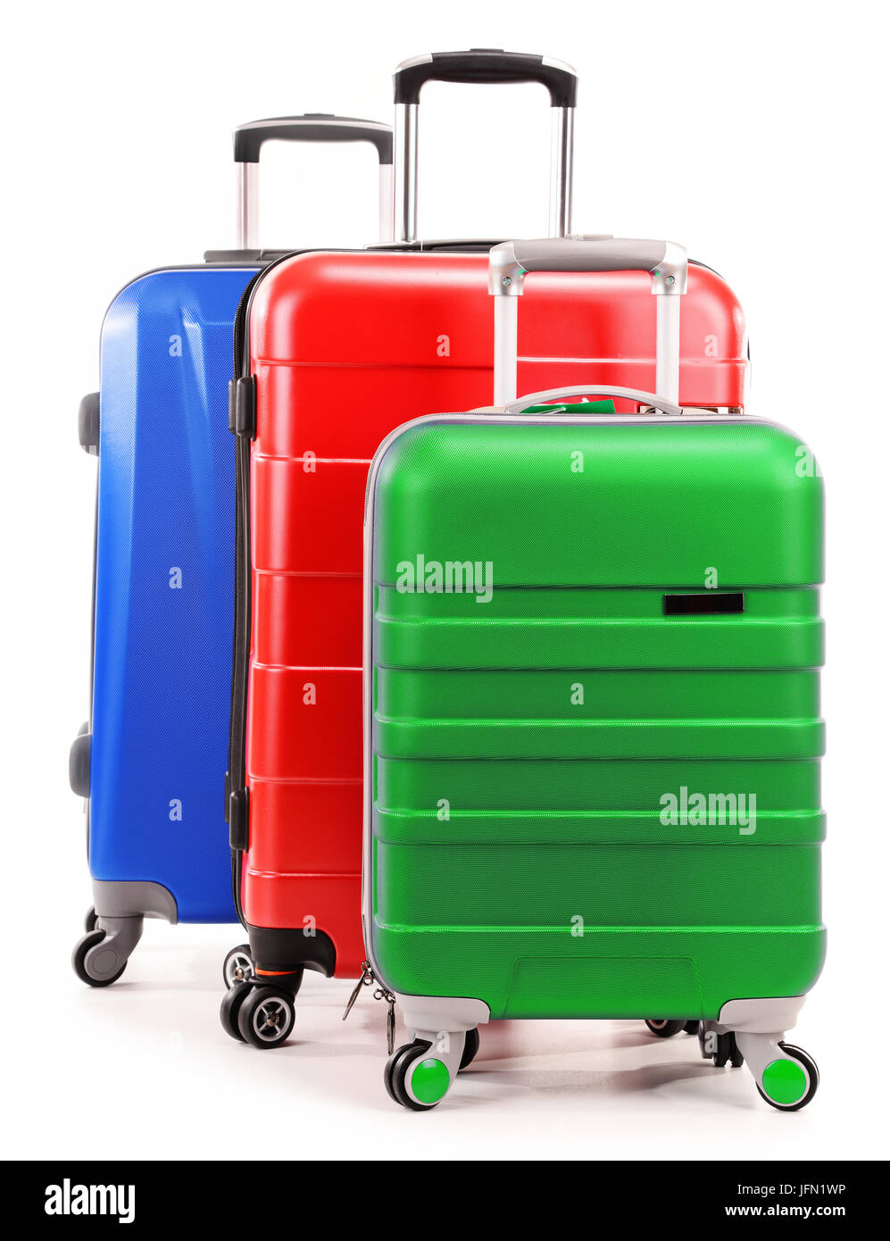 Plastic suitcases isolated on white background Stock Photo - Alamy