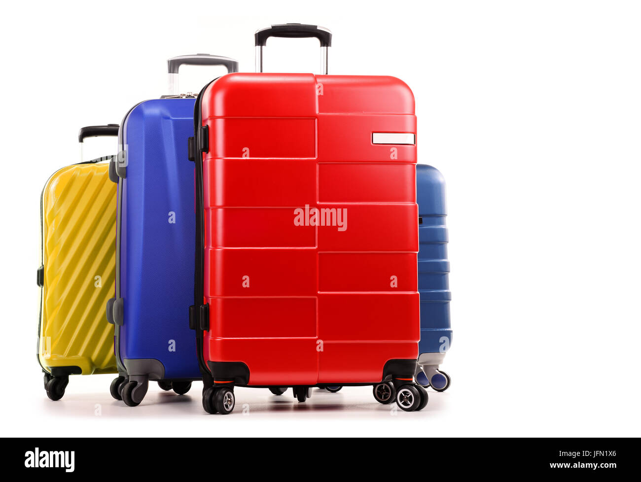 Plastic suitcases isolated on white background Stock Photo - Alamy