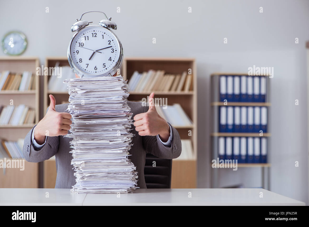 The businessman busy with paperwork in office Stock Photo - Alamy