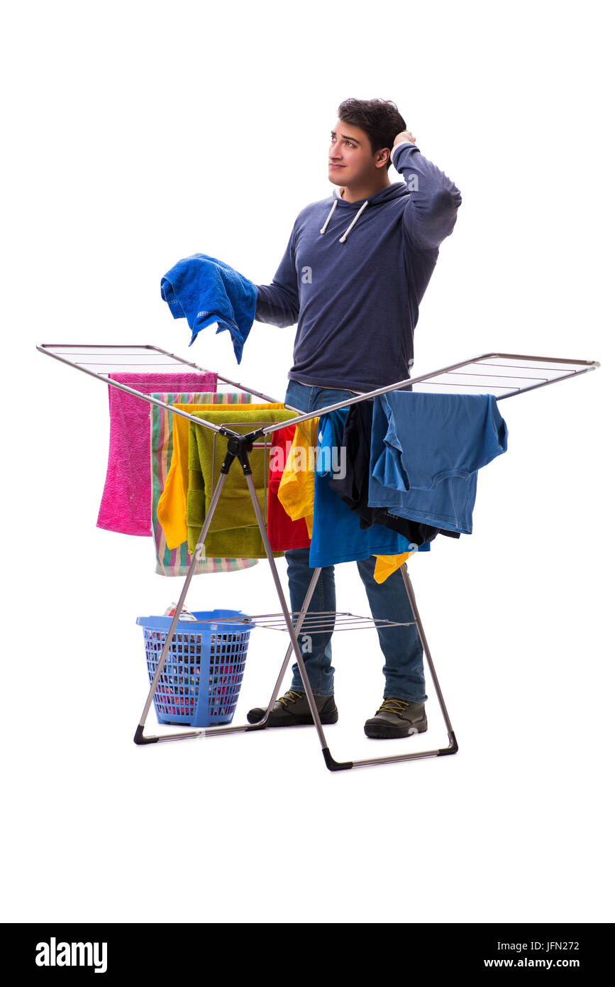 The husband man doing laundry isolated on white Stock Photo - Alamy