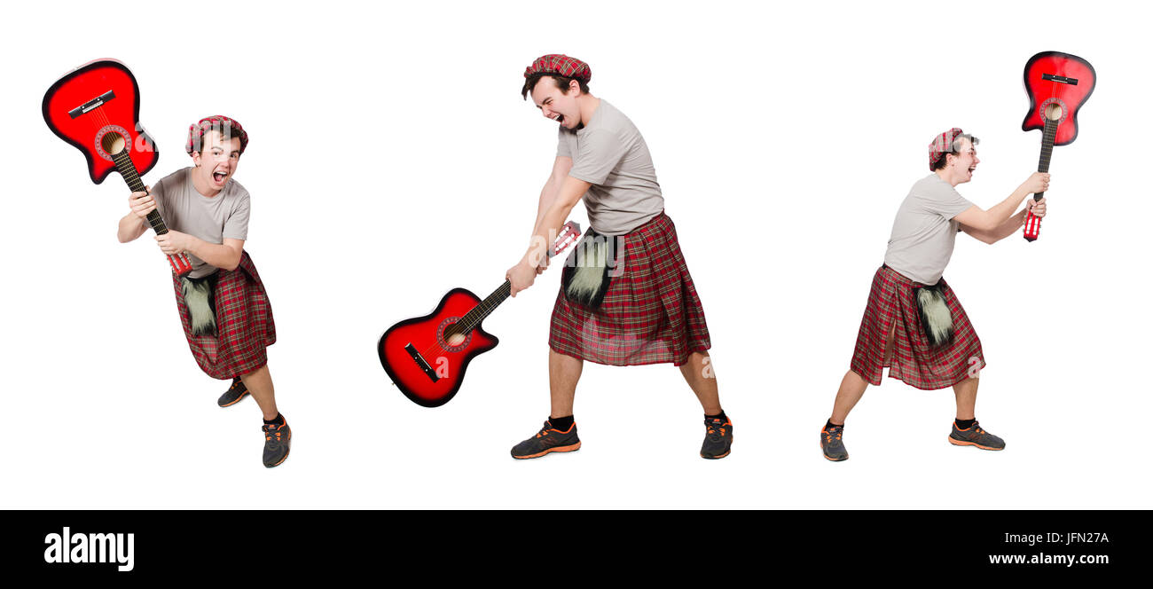 The scotsman playing guitar isolated on white Stock Photo - Alamy