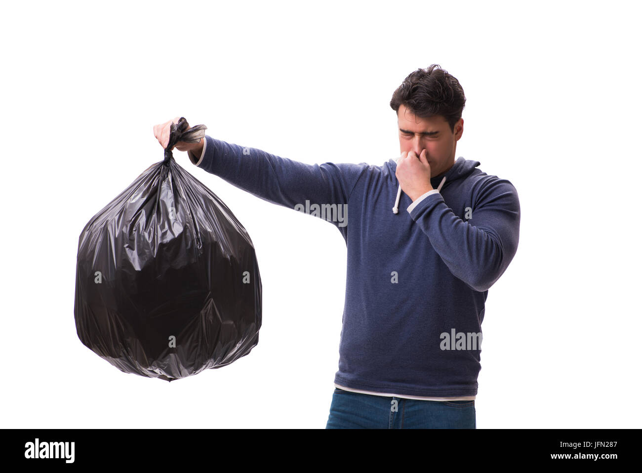 The man with garbage sack isolated on white Stock Photo - Alamy
