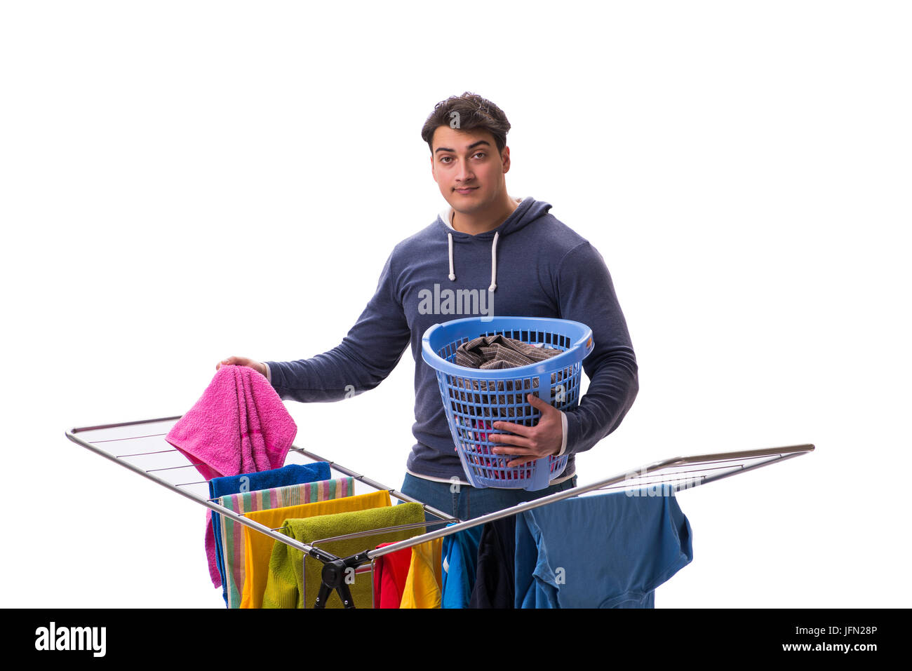The husband man doing laundry isolated on white Stock Photo - Alamy