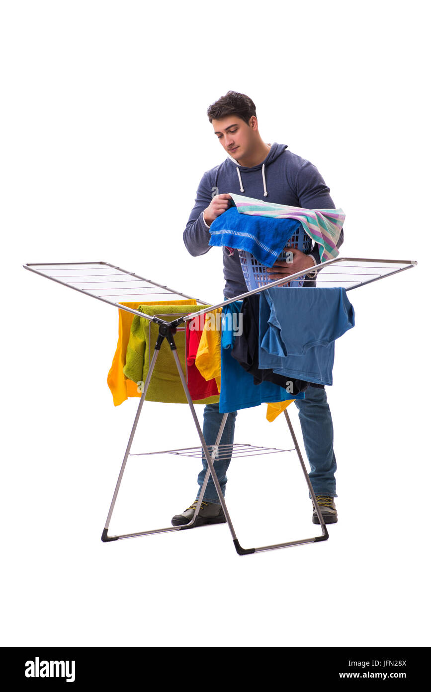 The husband man doing laundry isolated on white Stock Photo - Alamy