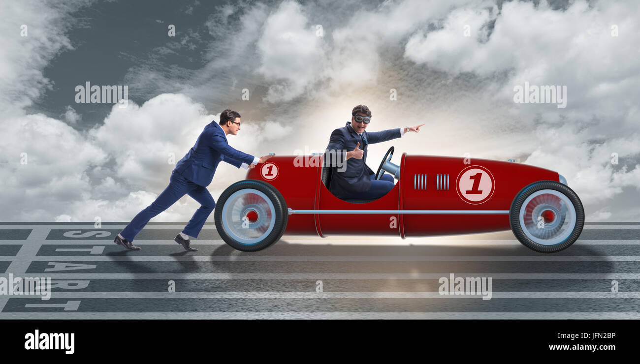 The businessman car pushing in teamwork concept Stock Photo - Alamy