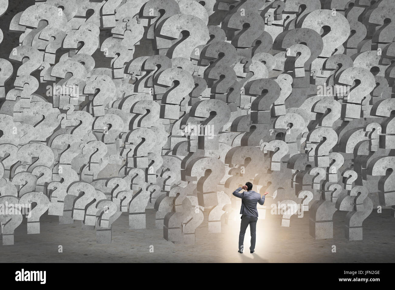 The businessman facing questions in business Stock Photo - Alamy