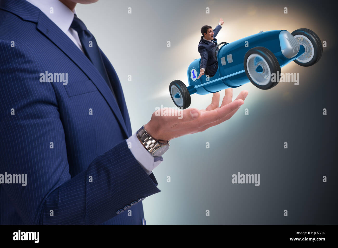 The man launching race car in start concept Stock Photo - Alamy