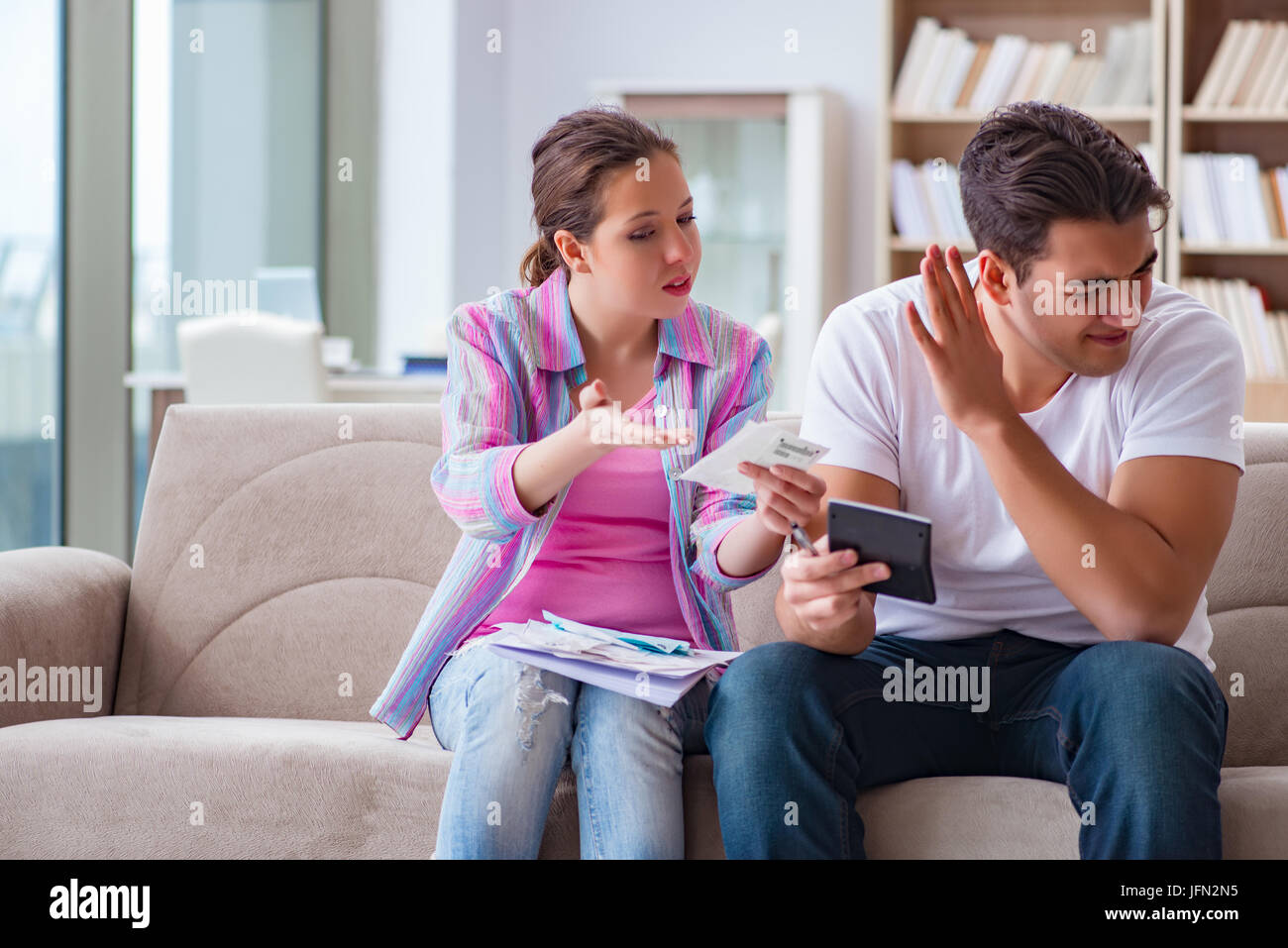 The young family discussing family finances Stock Photo - Alamy