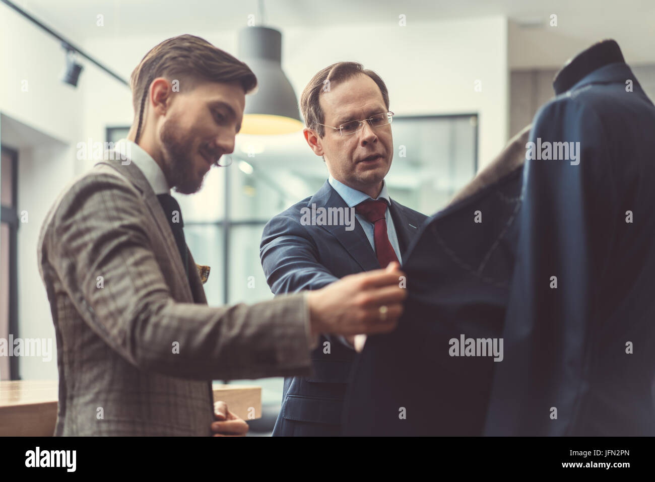 Tailoring person hi-res stock photography and images - Alamy