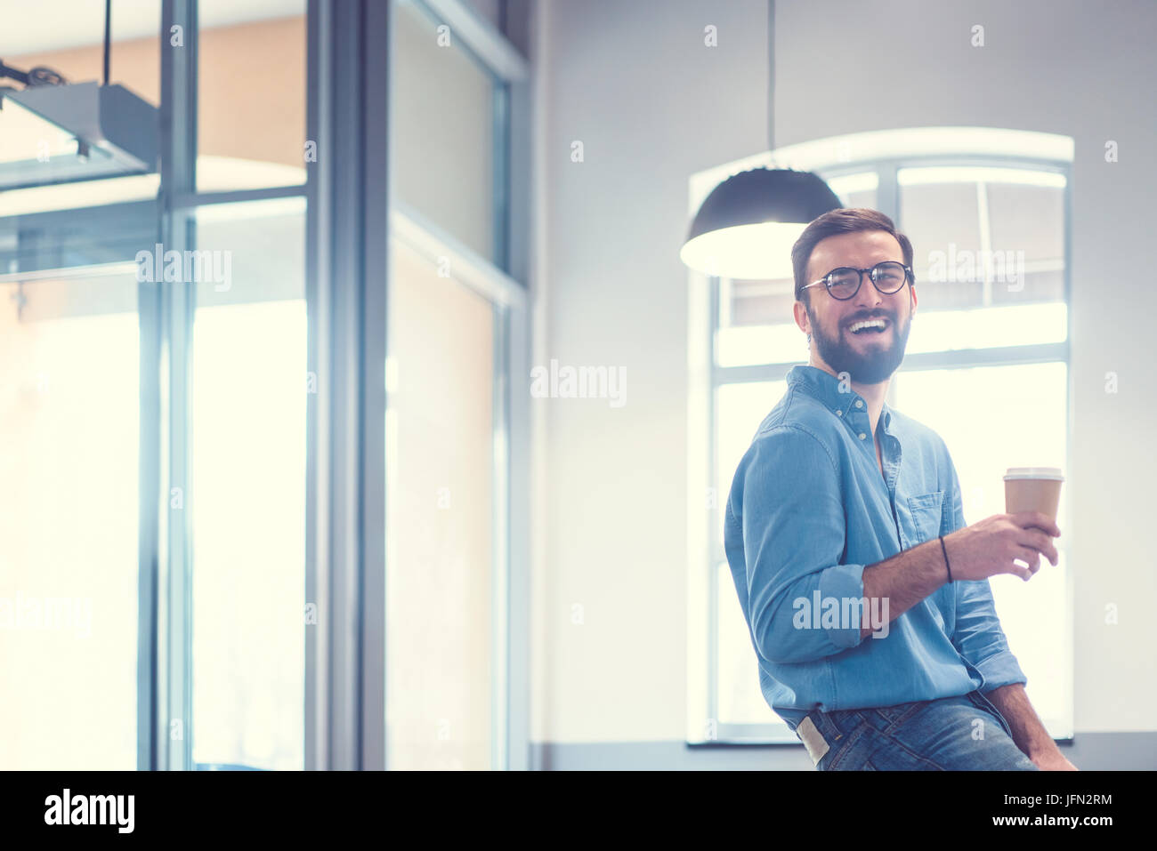 Happy handsome male customer hi-res stock photography and images - Alamy