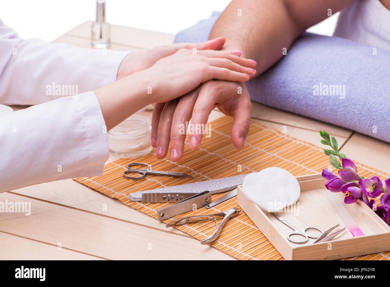 The hand manicure concept for man Stock Photo - Alamy