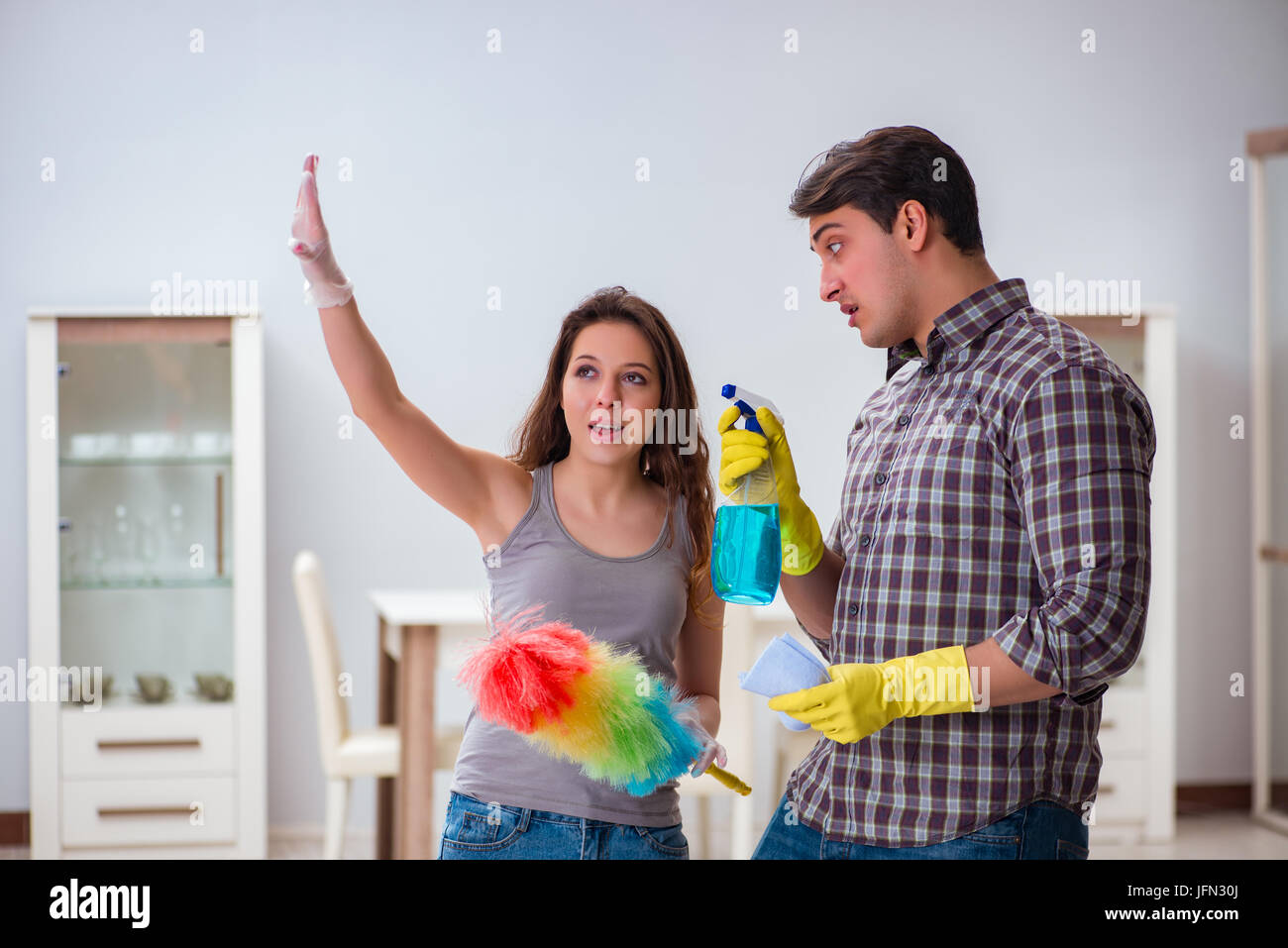 The wife and husband doing cleaning at home Stock Photo - Alamy