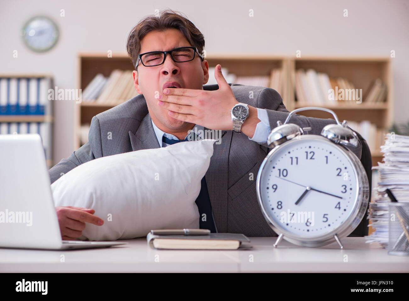 The tired man sleeping at home having too much work Stock Photo - Alamy