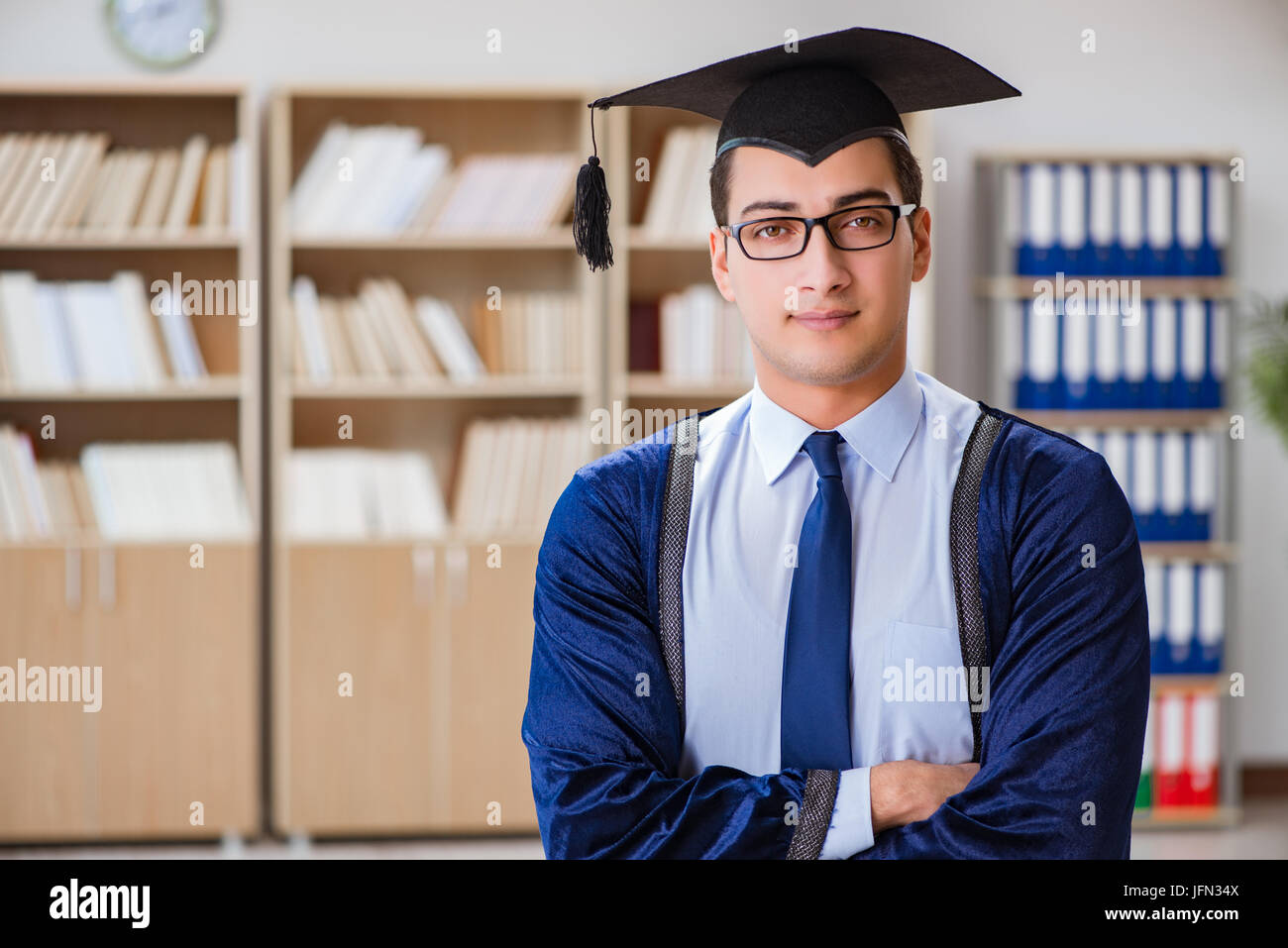 The young man graduating from university Stock Photo - Alamy