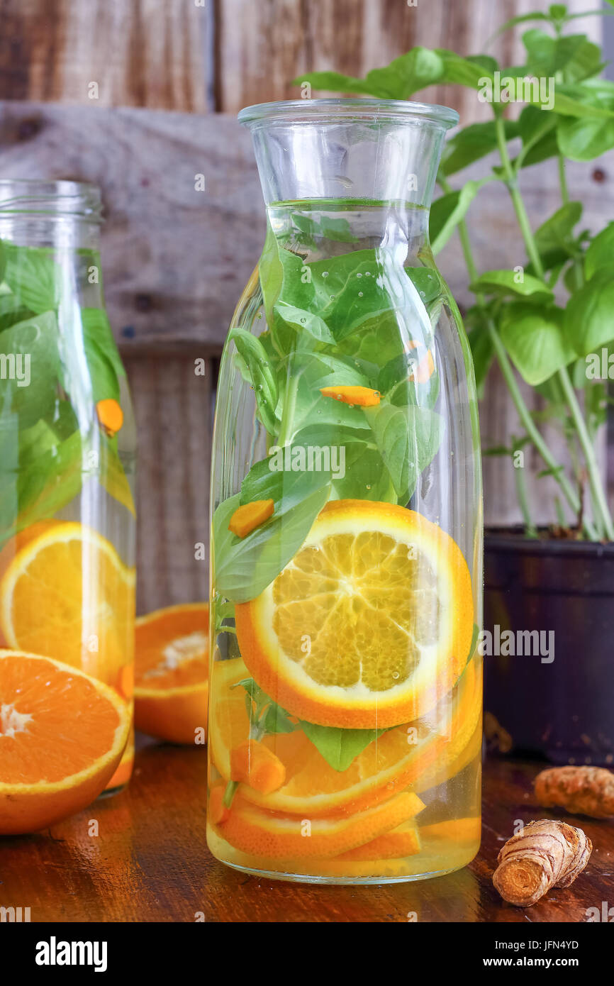 Orange and Basil Infused Water Stock Photo - Alamy