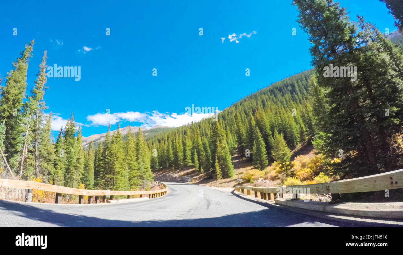 POV point of view - Driving through alpine forest of Guanella Pass in ...