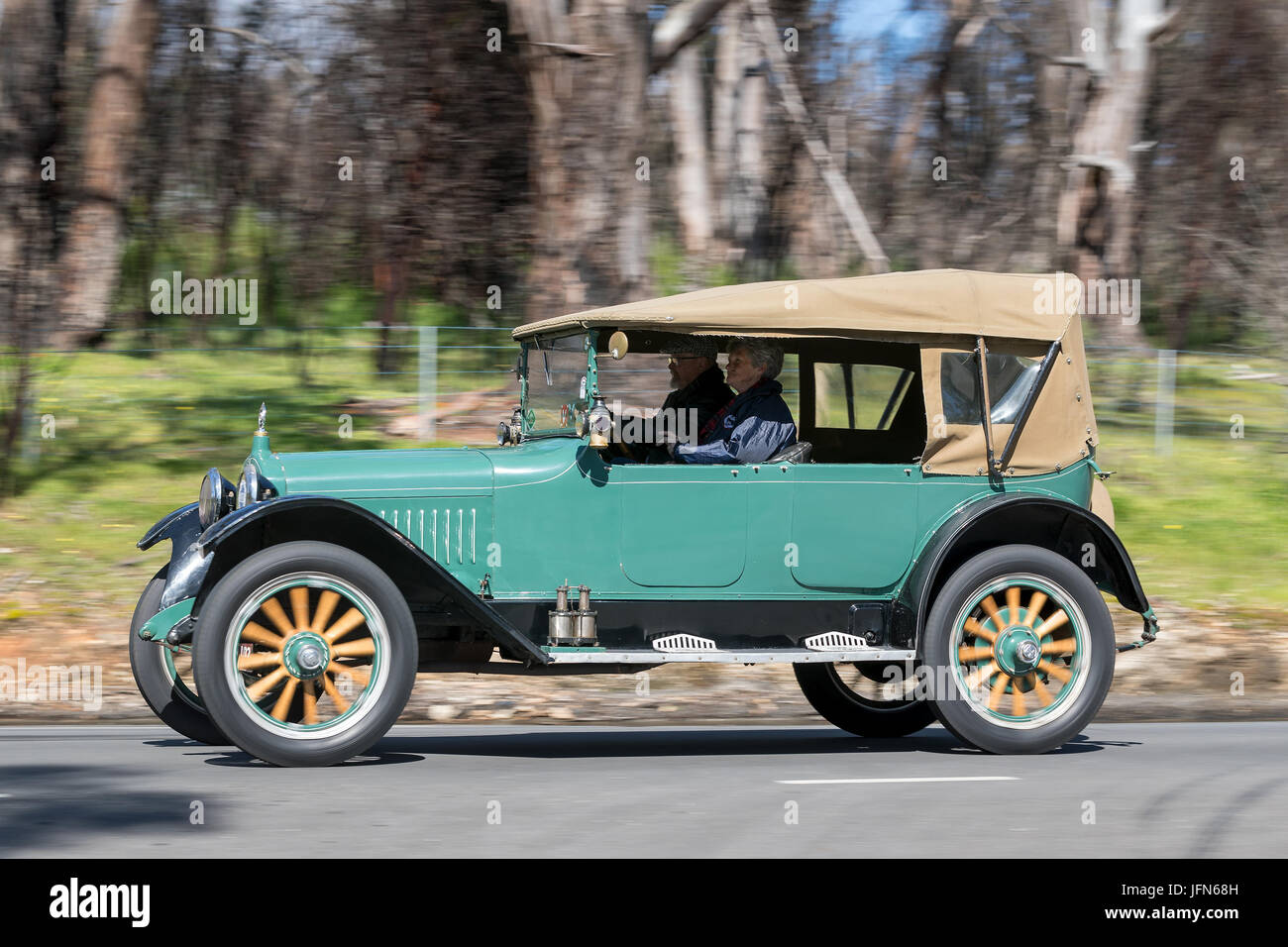 Vintage 1915 Hupmobile N Tourer driving on country roads near the town ...
