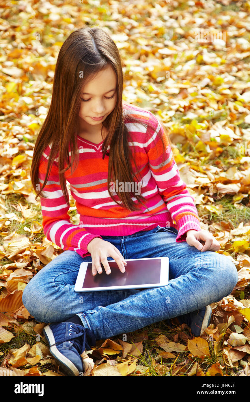 portrait of teenage girl with tablet computer outdoor Stock Photo - Alamy