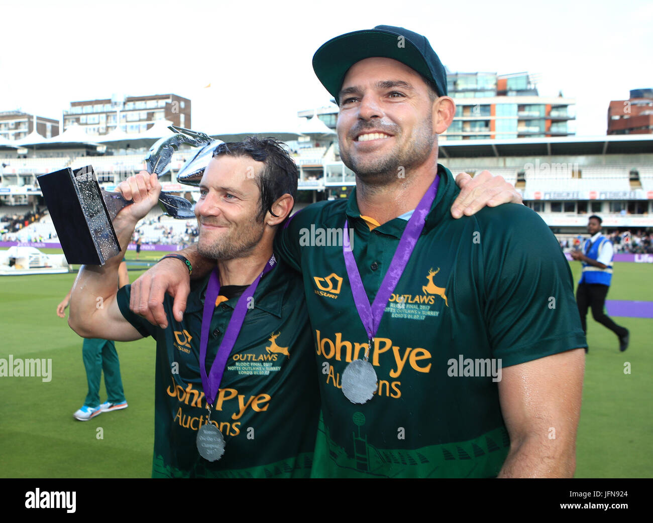 Nottinghamshire's Chris Read (left) celebrates with the trophy during ...