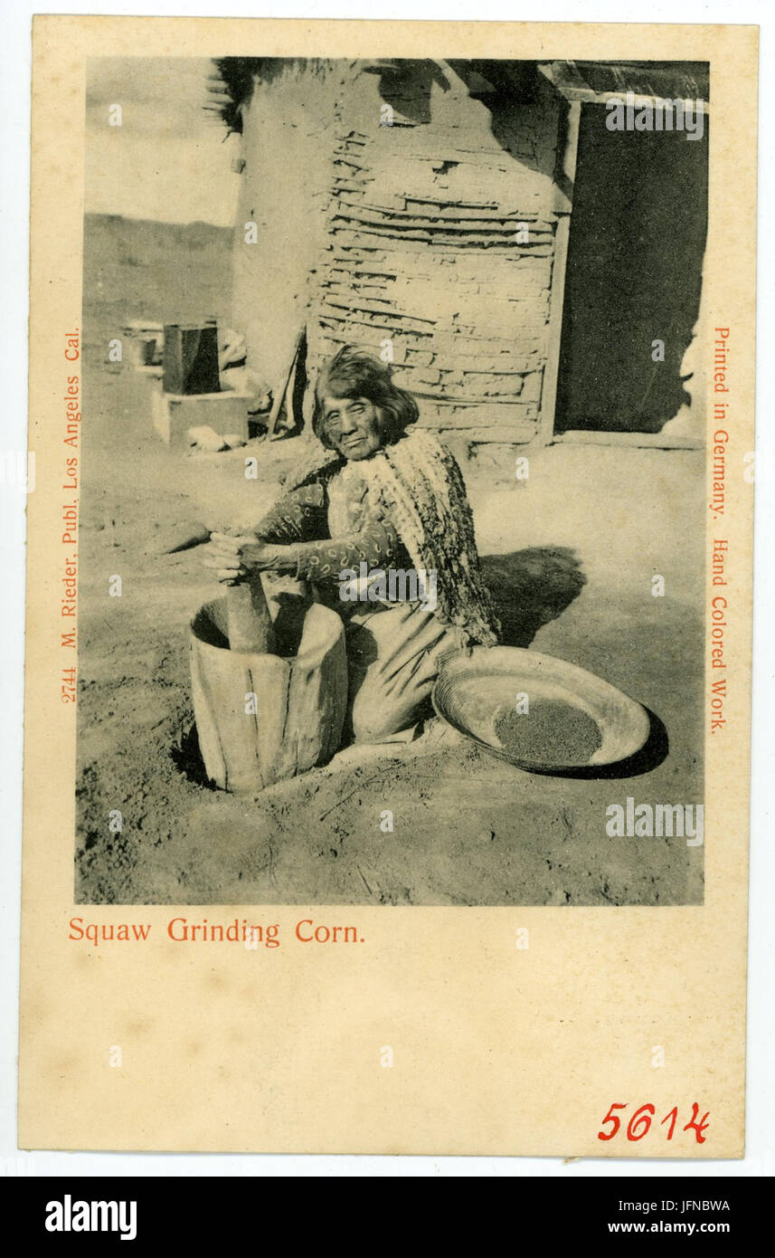 Native american woman grinding corn hi-res stock photography and images ...