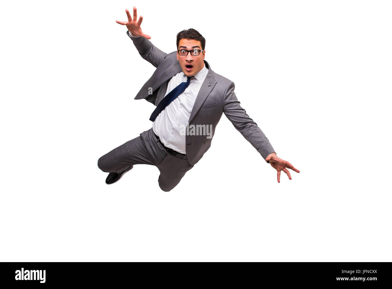 Falling businessman isolated on the white background Stock Photo - Alamy