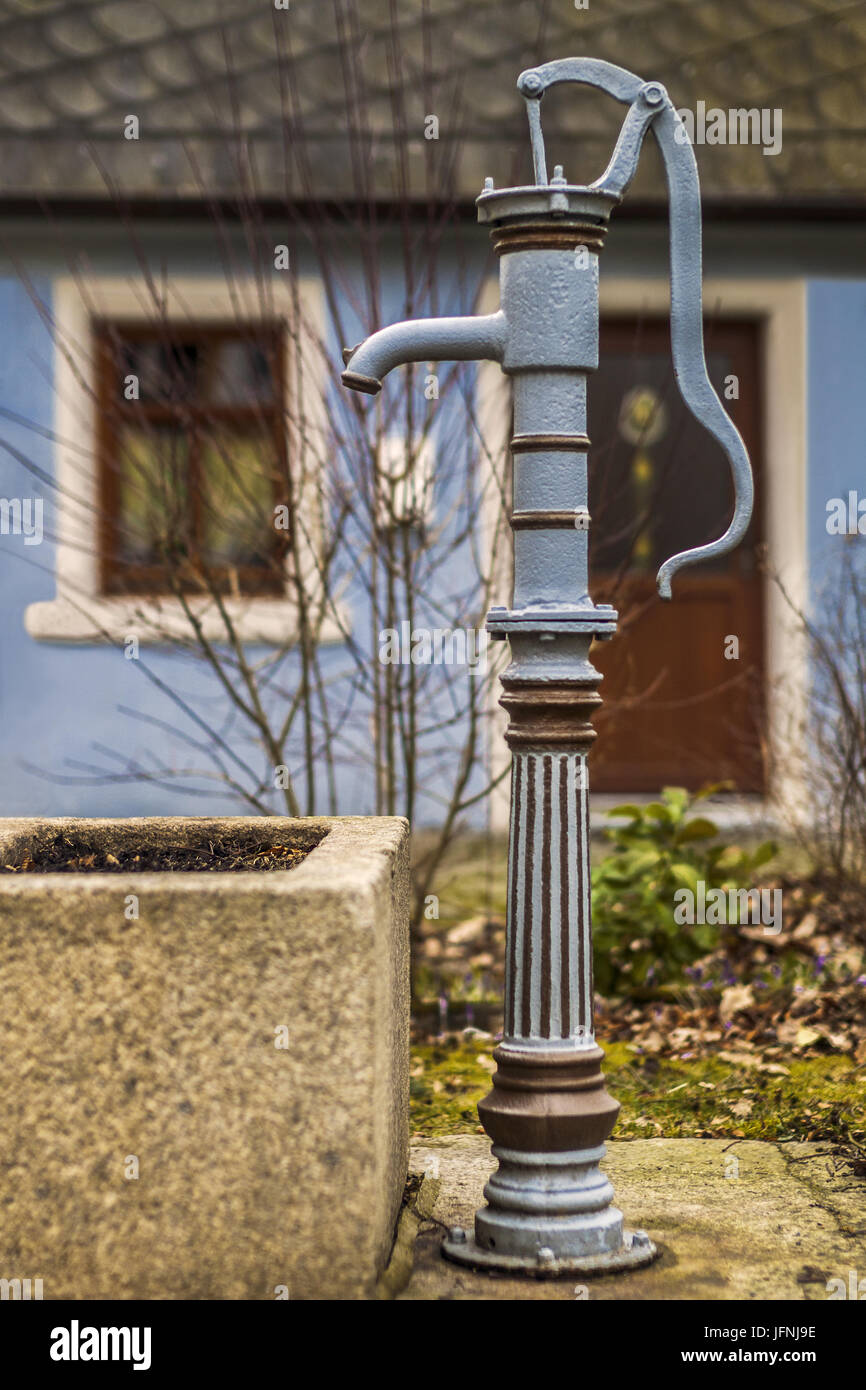 Old pump in front hi-res stock photography and images - Alamy