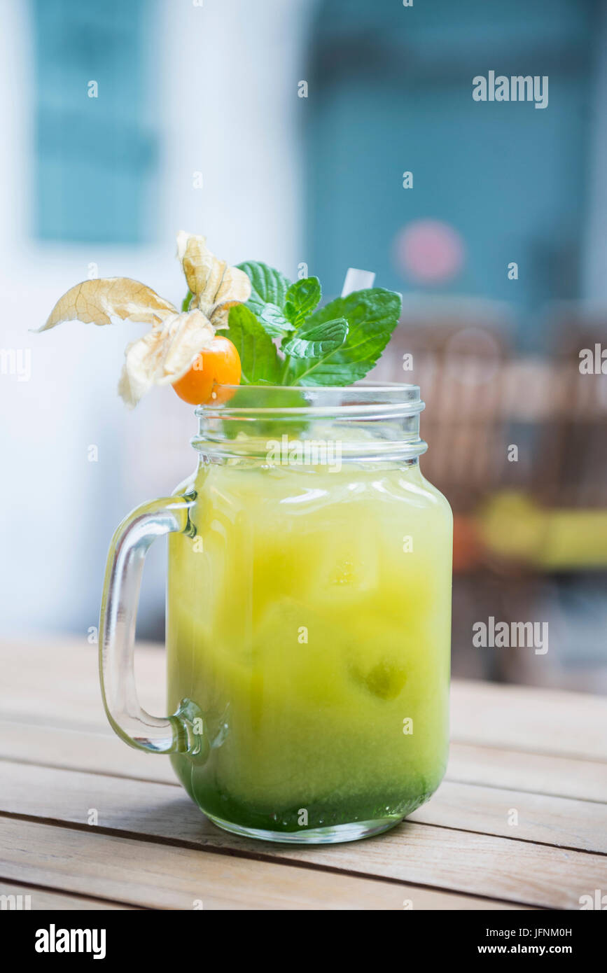 Close-up of green mocktail served in jar glass Stock Photo - Alamy