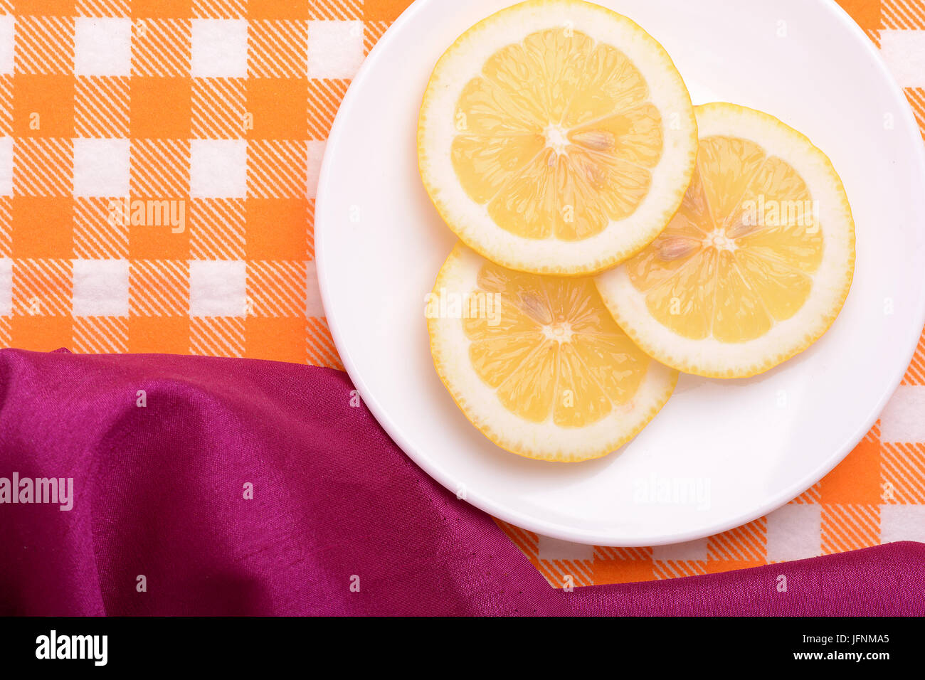 Isolated lemon on plate hi-res stock photography and images - Alamy