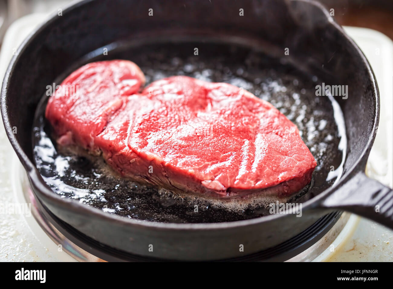 Black angus beef hand hi-res stock photography and images - Alamy
