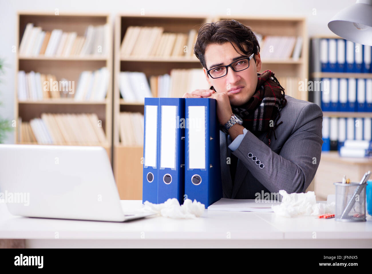 Sick ill businessman laptop blowing hi-res stock photography and images ...