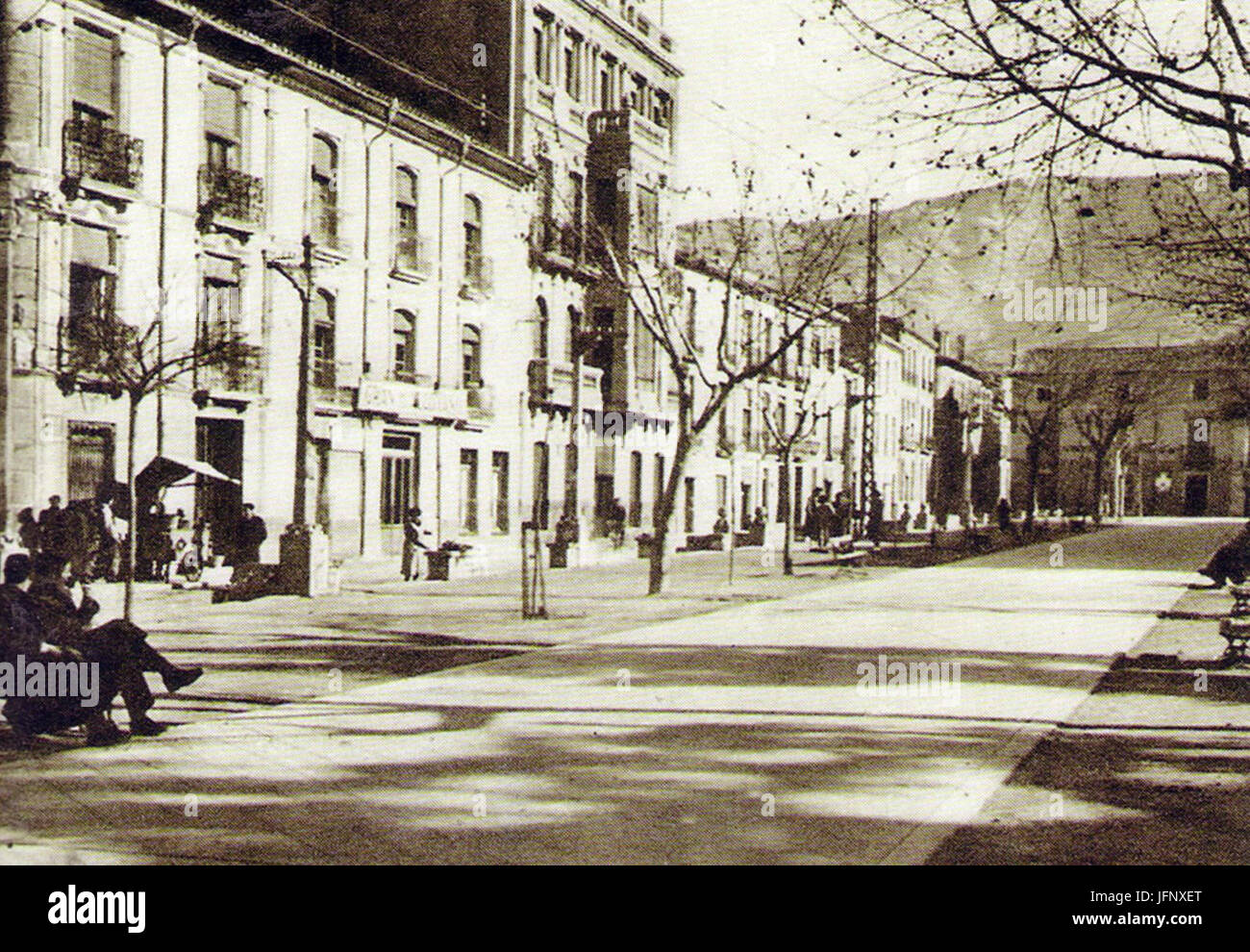 This 1930 photograph captures the Paseo Chap, a scenic walkway in a ...