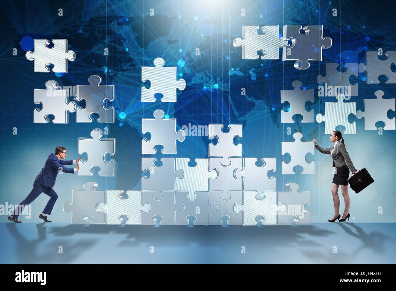 Business concept of teamwork with puzzle pieces Stock Photo - Alamy