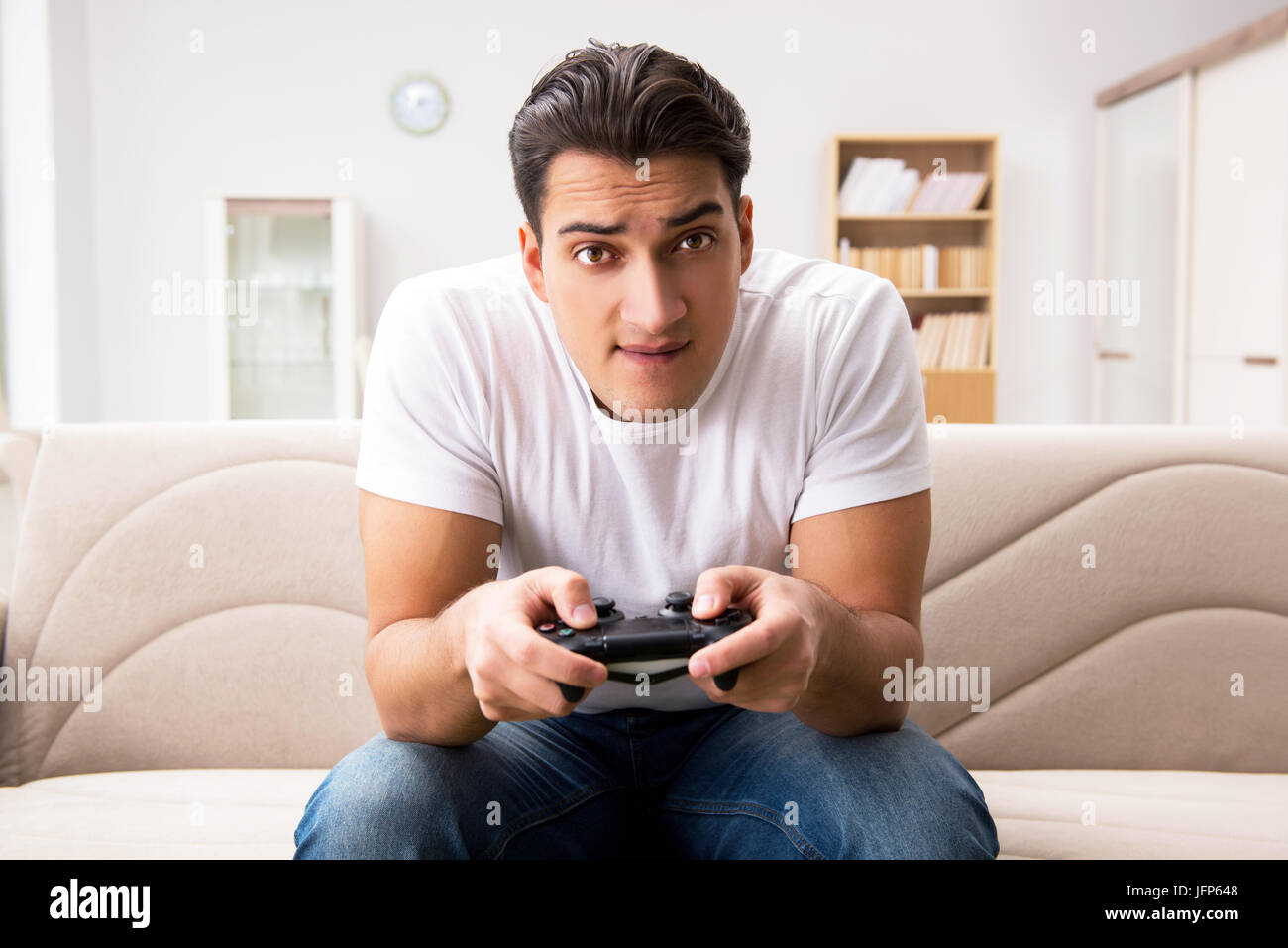 The man addicted to computer games Stock Photo - Alamy