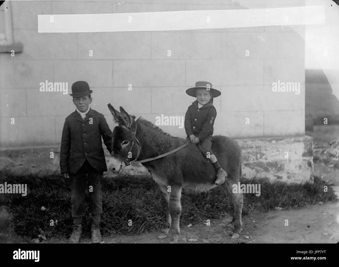 A boy riding a donkey Pembroke NLW3363 0 Stock Photo - Alamy