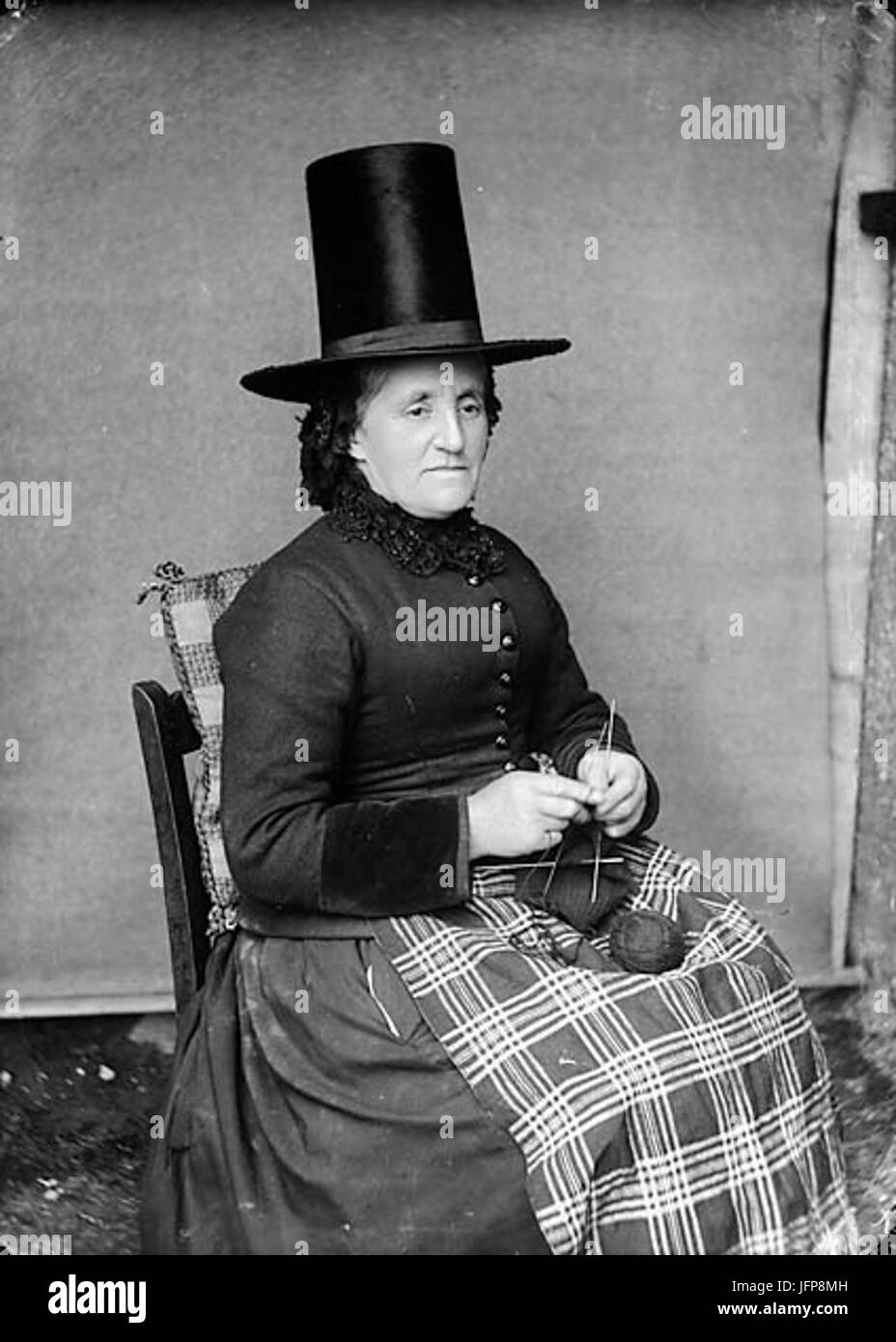 Old woman in traditional dress Black and White Stock Photos & Images ...
