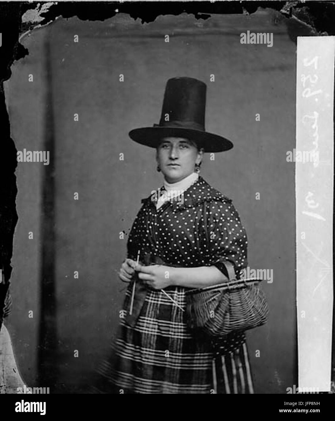 This image shows a woman wearing traditional national dress while ...